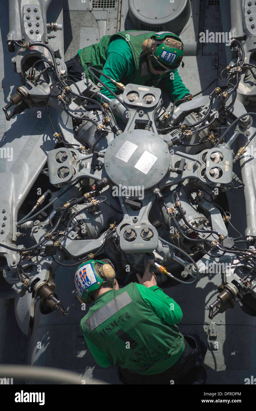 Aviation Structural Mechanical 3rd Class Randy Bishop, top, and ...