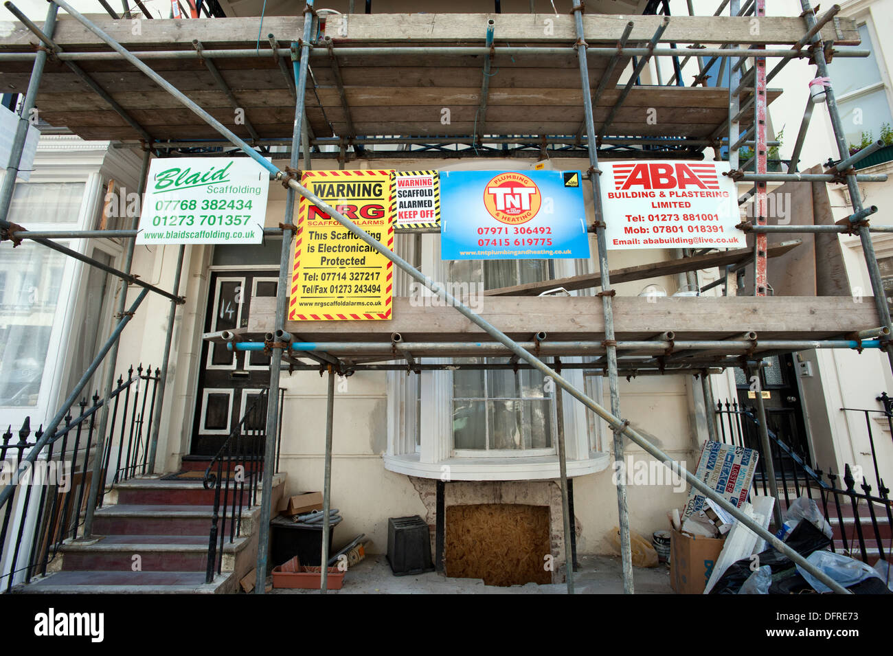 Builders' advertising boards on scaffolding on an 1822 built Regency ...