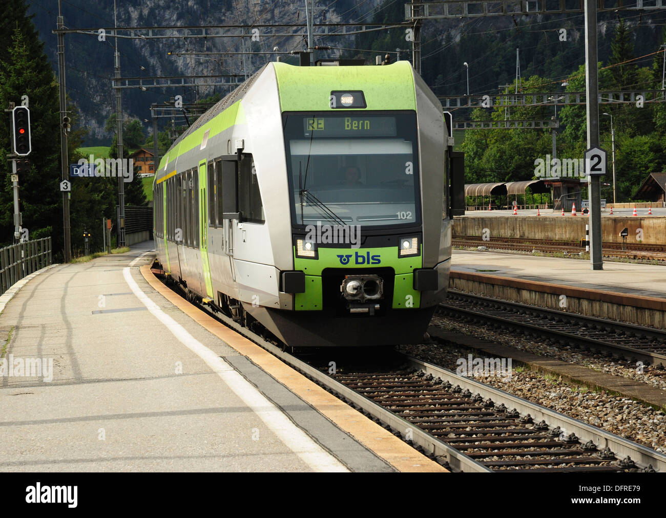 BLS passenger train for Bern arriving at Kandersteg station ...