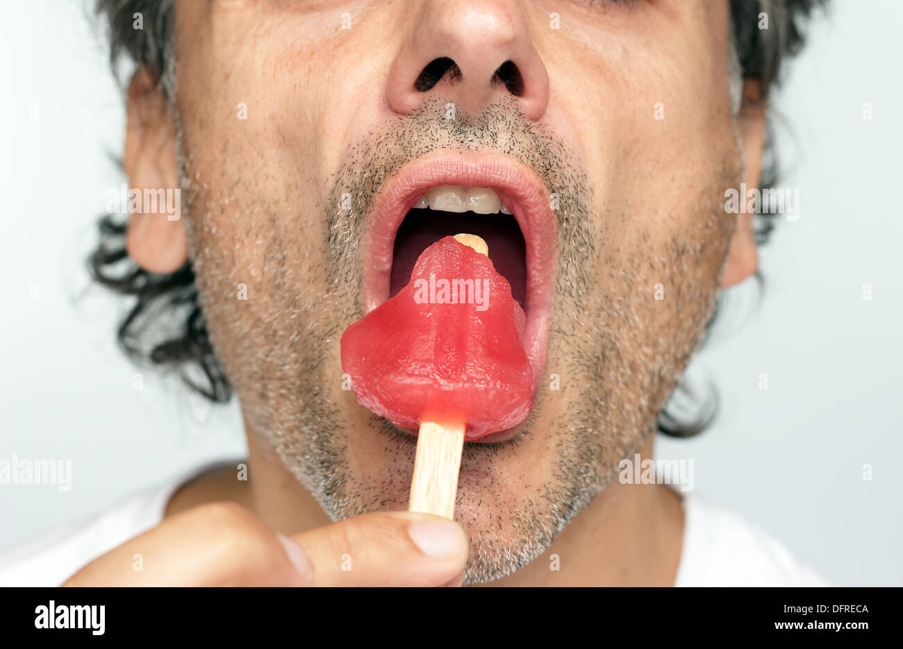 Eating popsicle adult hi-res stock photography and images - Alamy