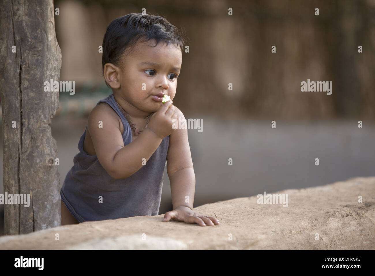 Tribal Child eating, Khalwa, Jharikheda village, Madhya Pradesh, India ...