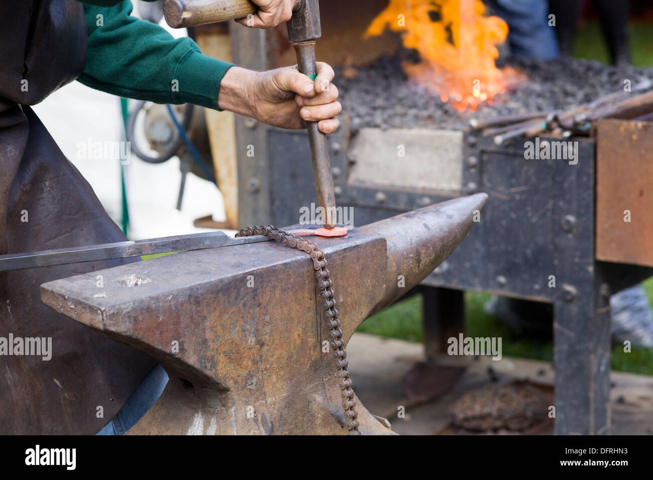 Blacksmith working with metal in a Mobile Forge Stock Photo - Alamy