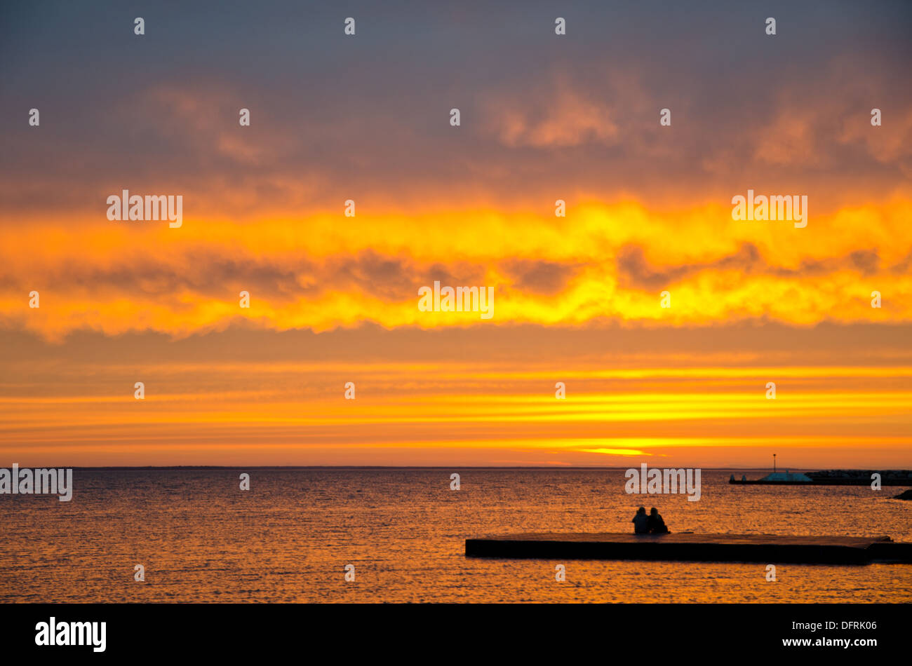 Watching sunset at the baltic sea hi-res stock photography and images ...