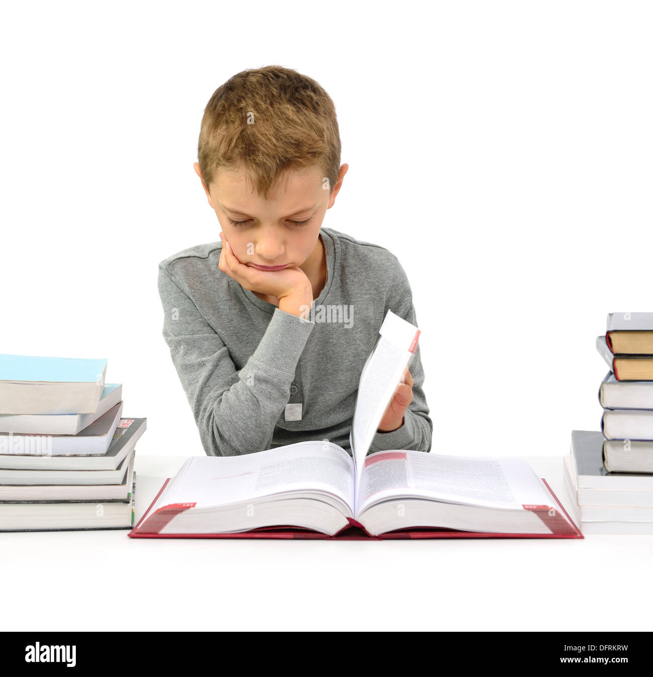Boy reading a book, learning Stock Photo - Alamy