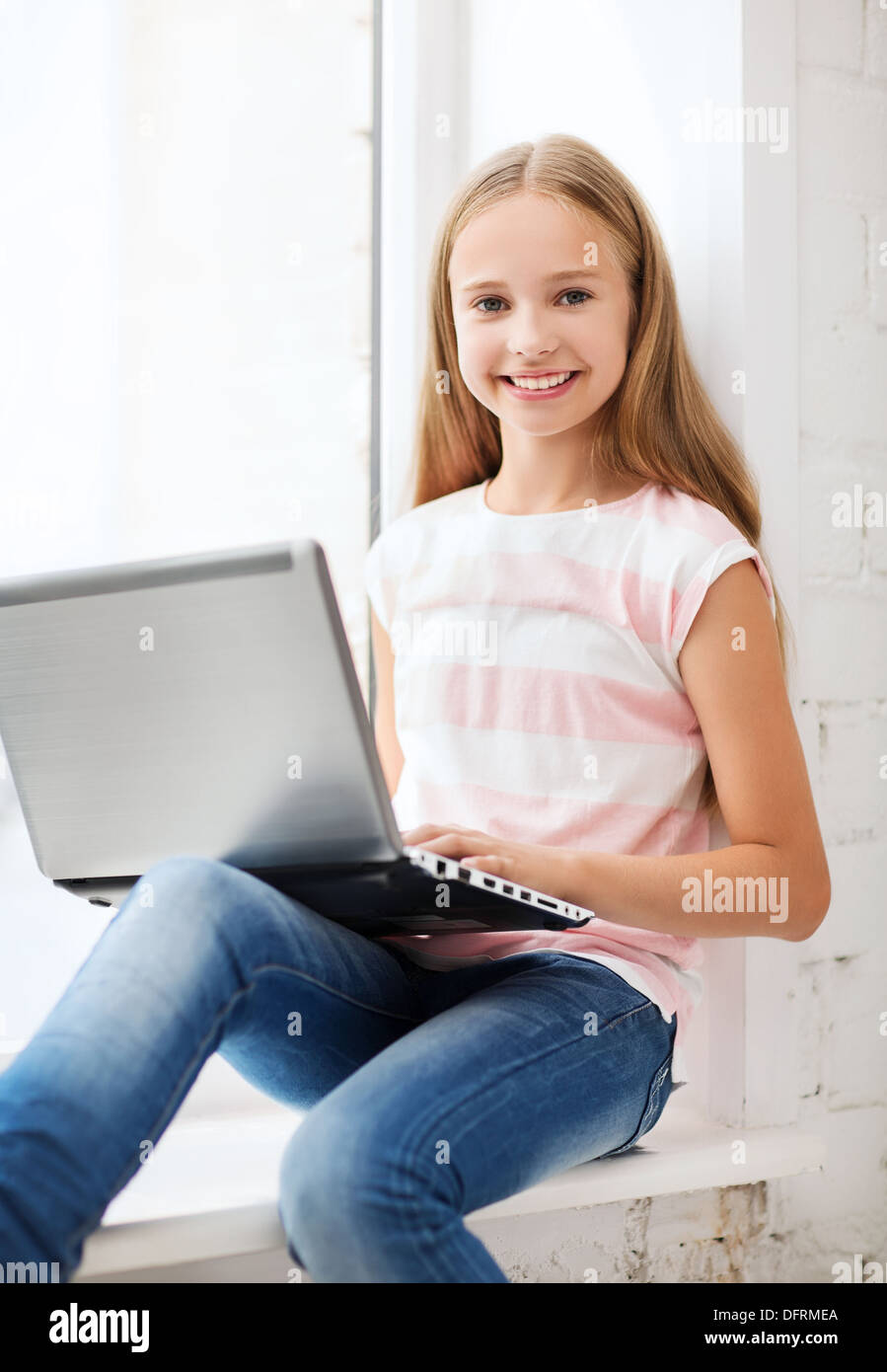 girl with laptop pc at school Stock Photo - Alamy