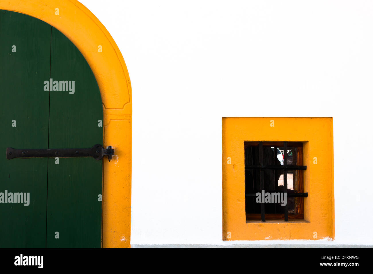 small window and door with yellow border Stock Photo - Alamy