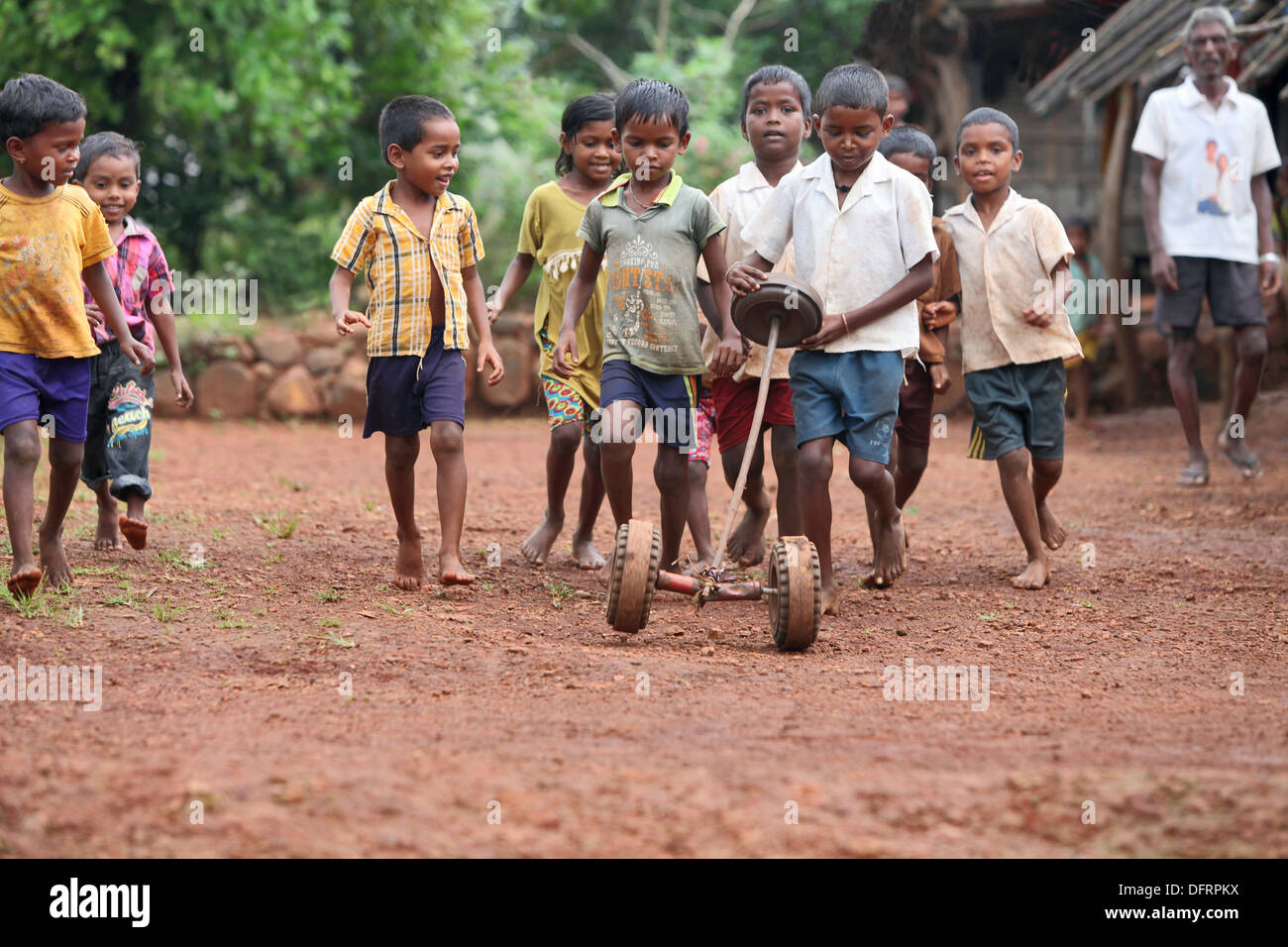 Katkari tribal children playing on the street, Karambali village ...