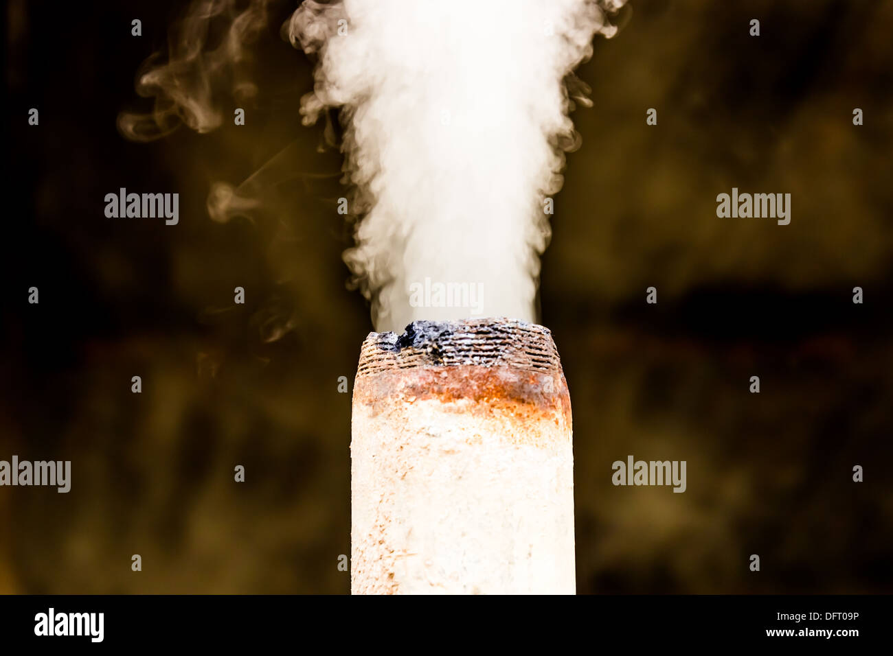 Smoke coming out of the pipe Stock Photo - Alamy
