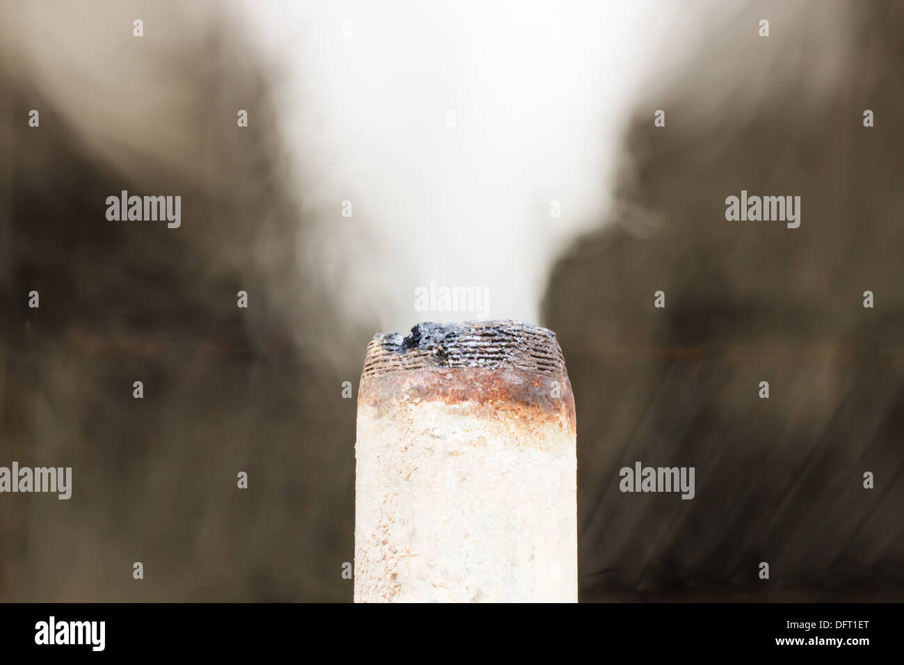 Smoke coming out of the pipe Stock Photo - Alamy