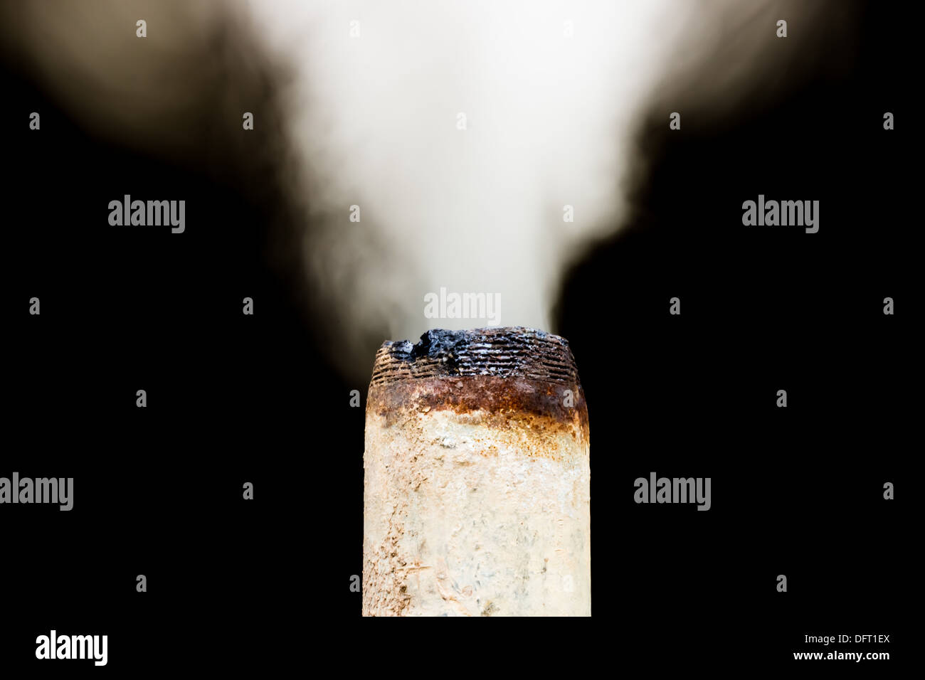 Smoke coming out of the pipe Stock Photo - Alamy