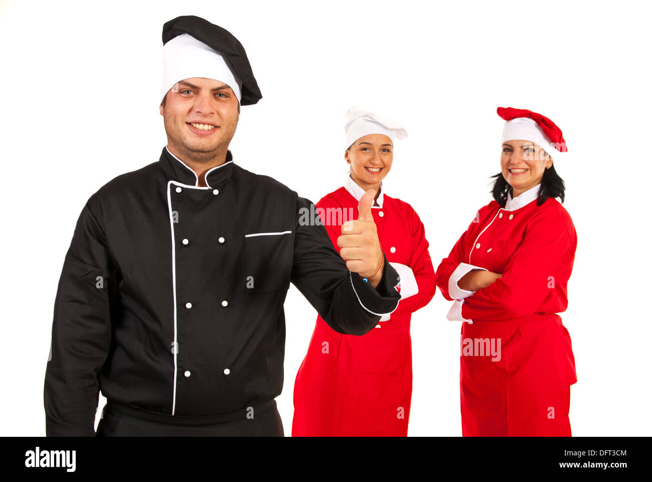 Successful team of three chefs with teacher chef in front of image ...