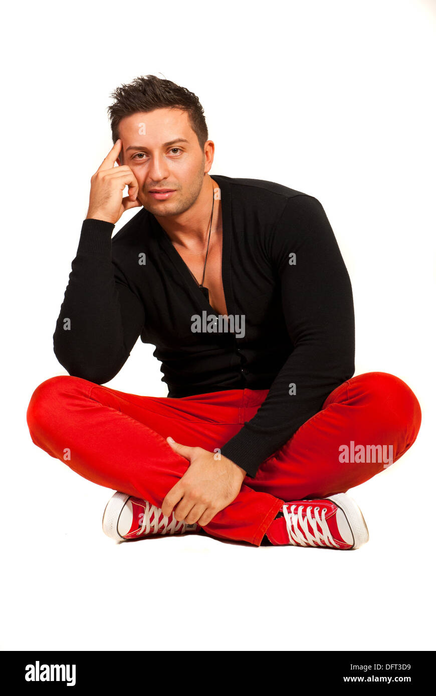 Male model sitting legs crossed hi-res stock photography and images - Alamy