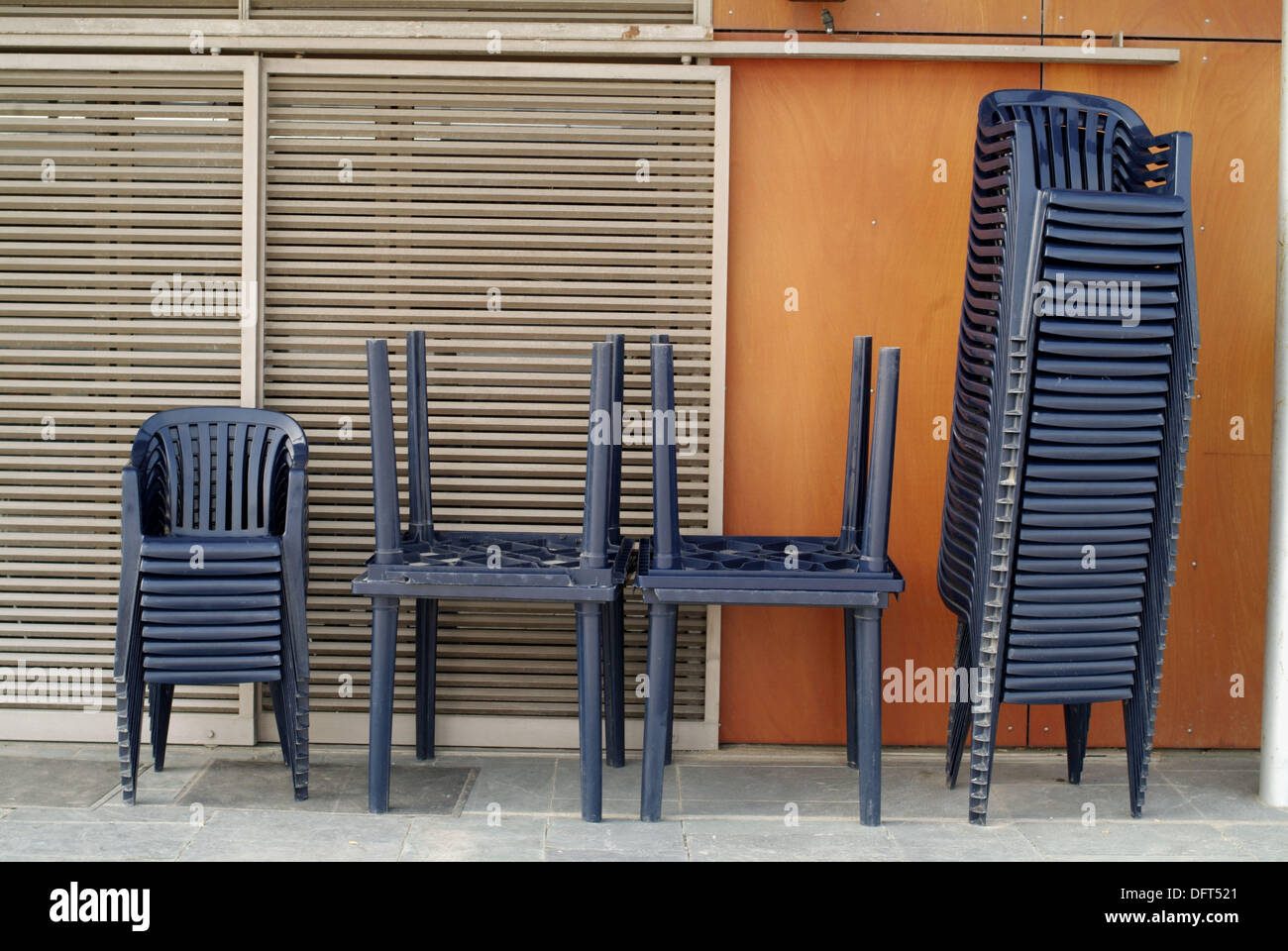 Tables piled up hi-res stock photography and images - Alamy