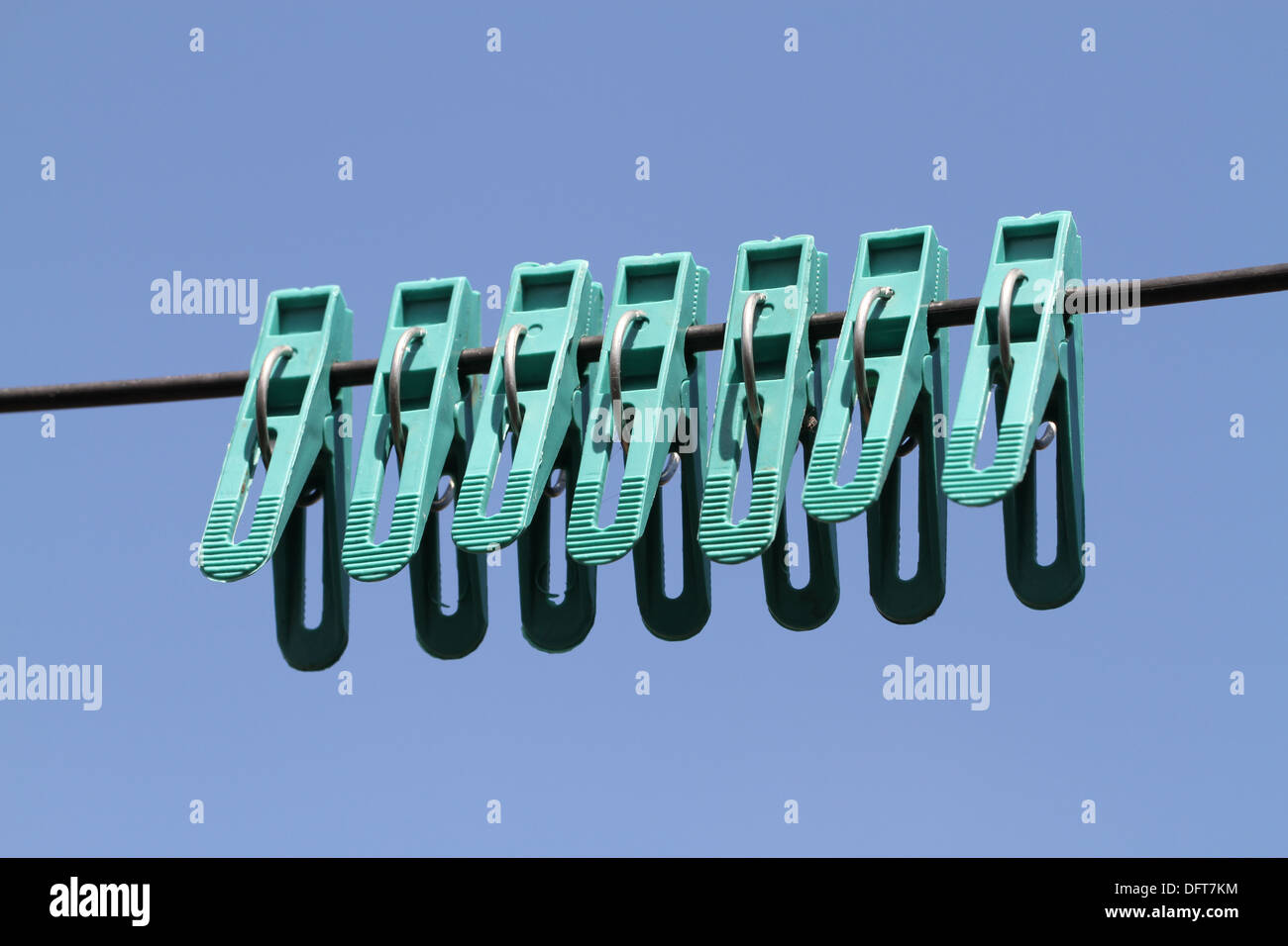 Clip clothes hi-res stock photography and images - Alamy