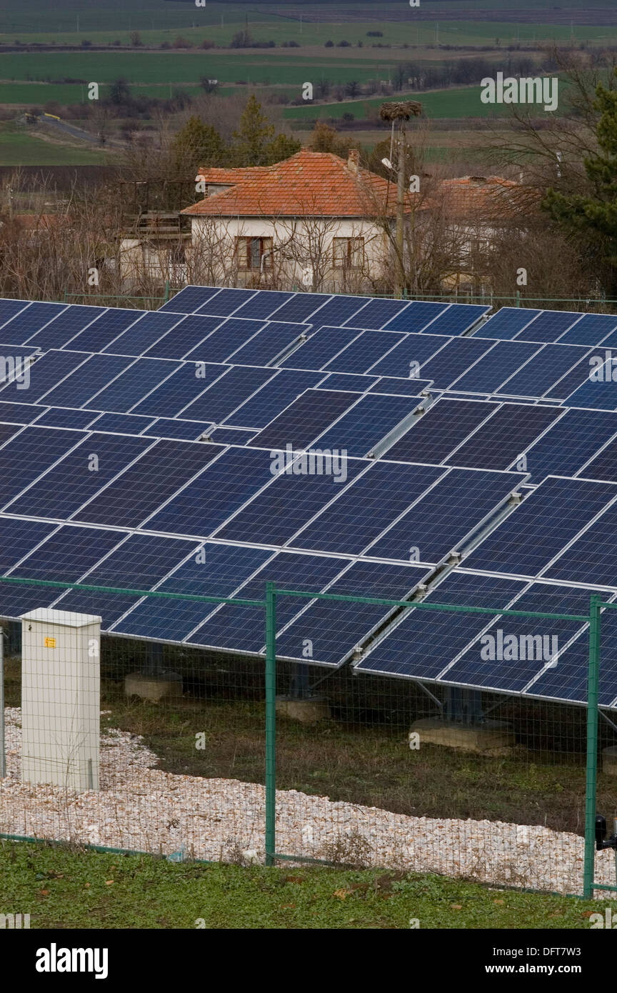 Solar power farm in a rural village Stock Photo - Alamy