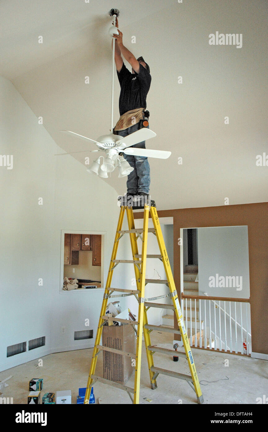 Installing ceiling panels ladder hi-res stock photography and images ...