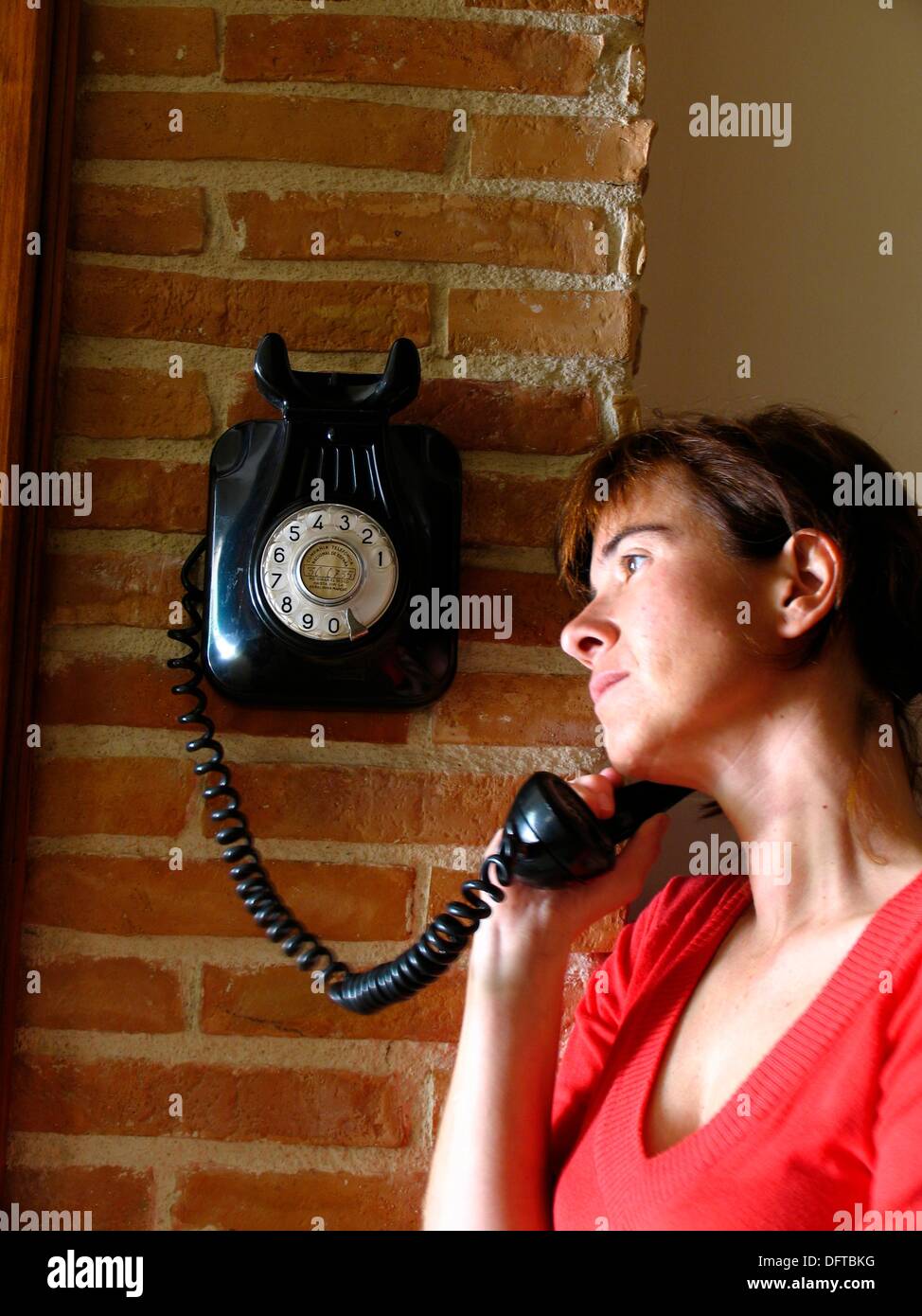 Old fashioned telephone receiver woman hi-res stock photography and ...