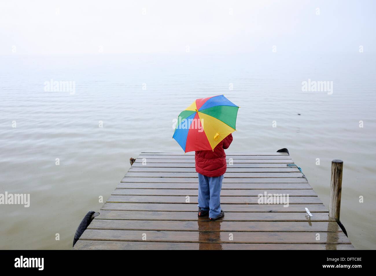 Rain umbrella pier hi-res stock photography and images - Alamy