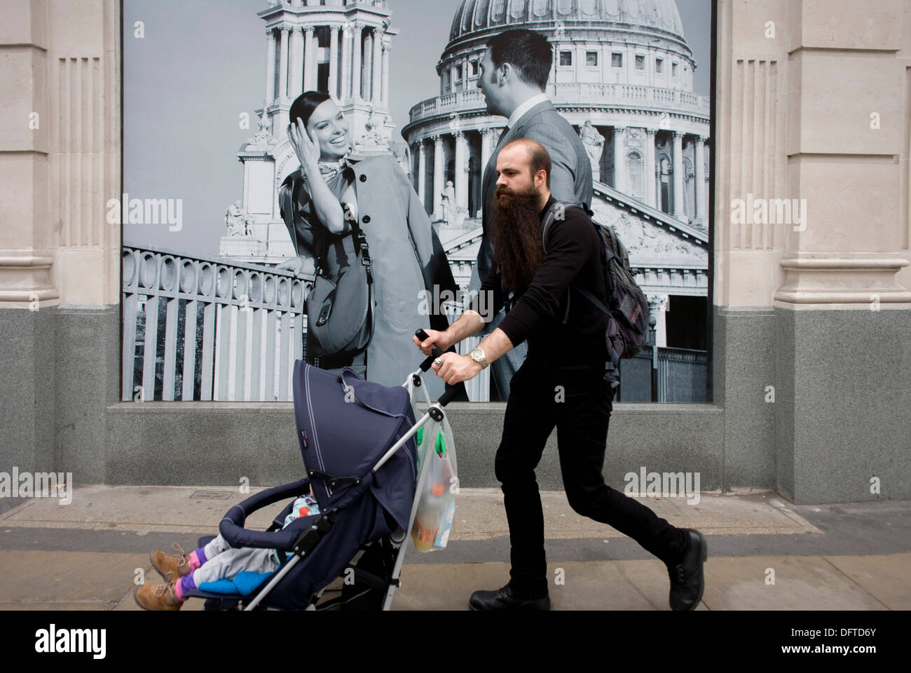 Man pushing pushchair buggy hi-res stock photography and images - Alamy
