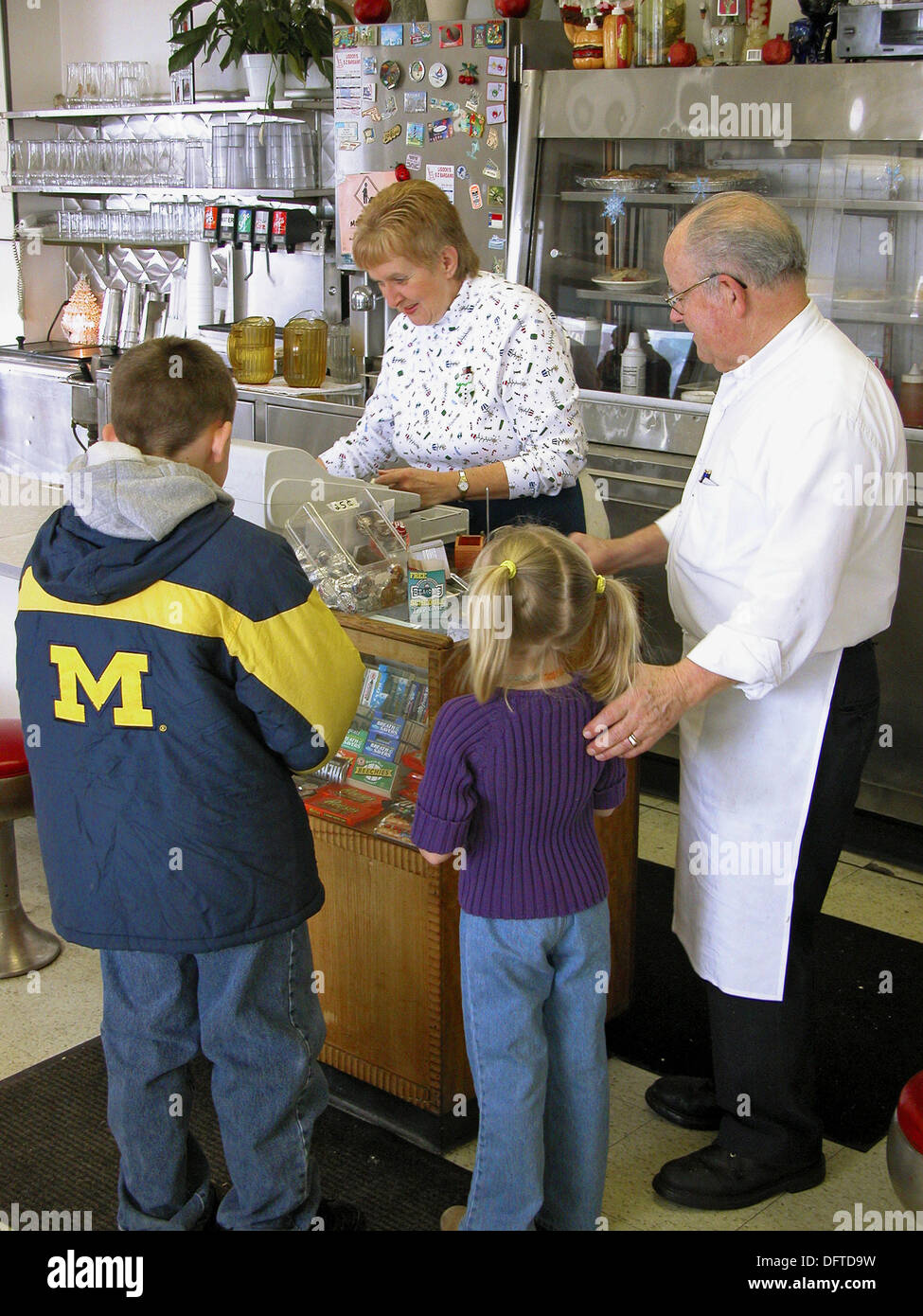 Boy cash pay counter hi-res stock photography and images - Alamy