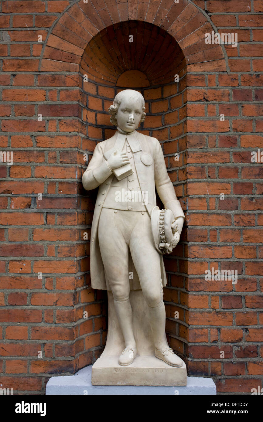 Statue of a young boy outside St Botolph's Church Hall. Originally an ...