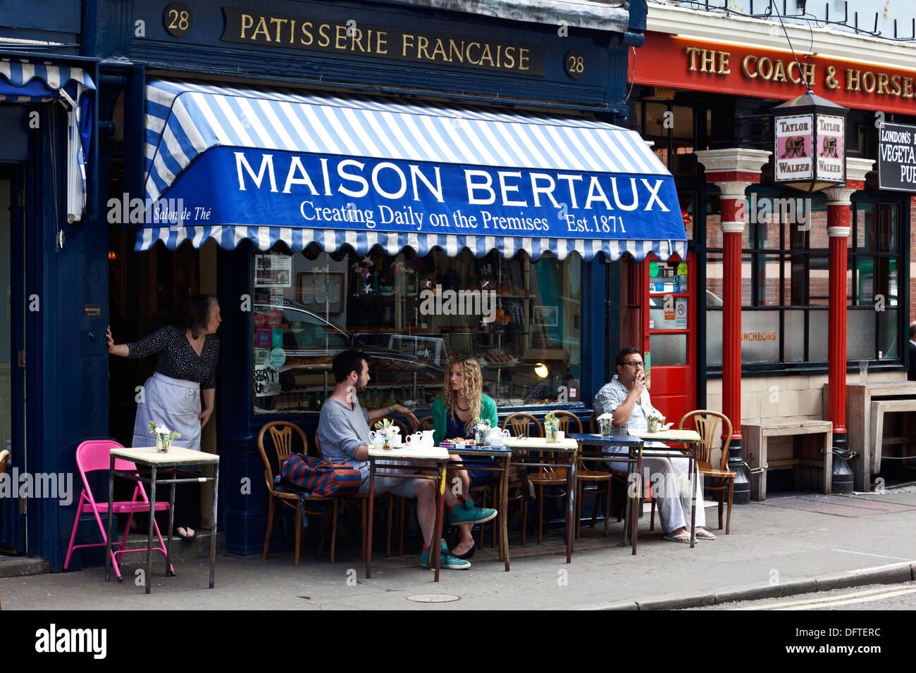 Tables outside Maison Bertaux, London's oldest patisserie Stock Photo ...