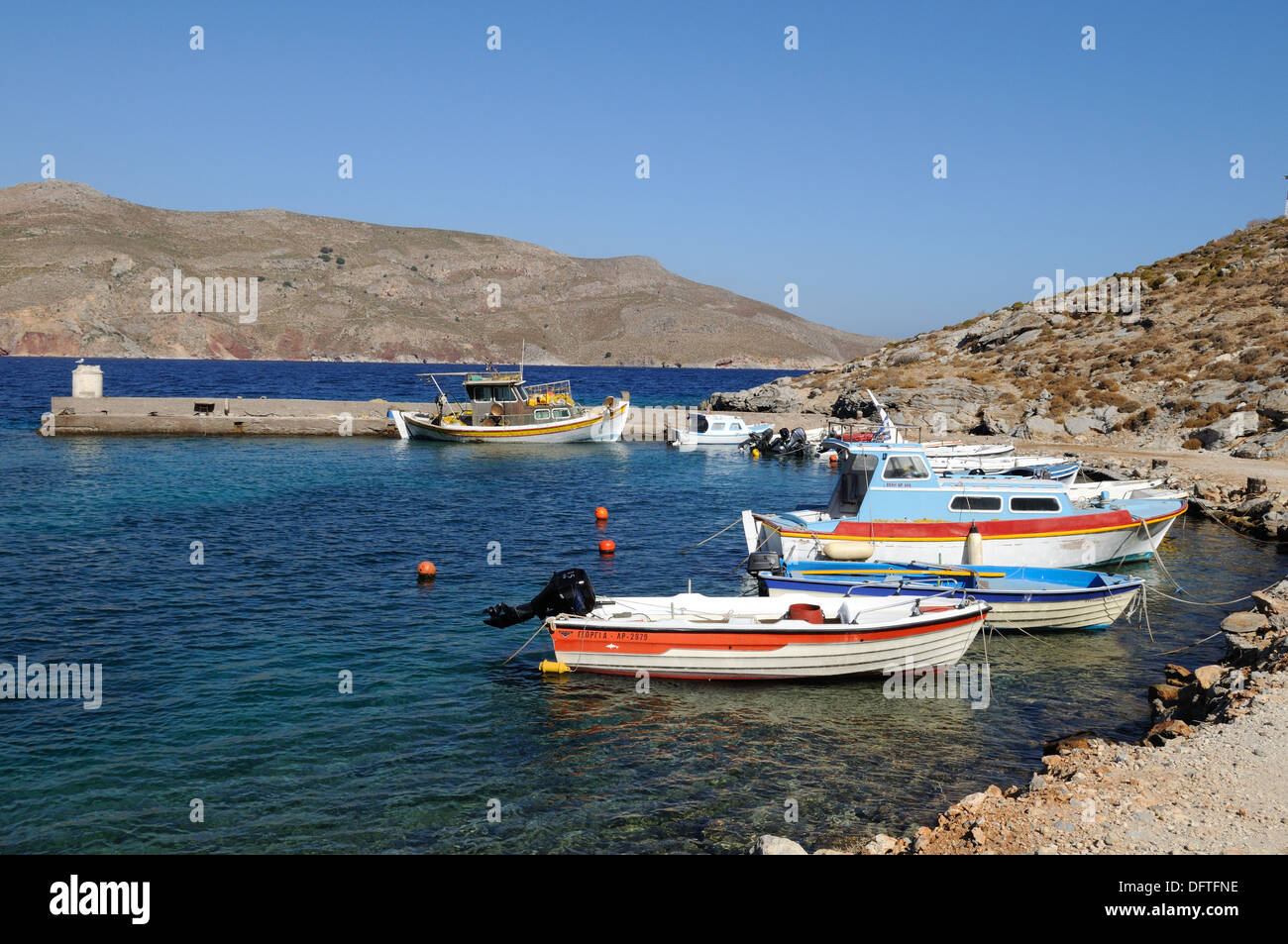 Small fishing harbour near Livadia Tilos Greek Island The Dodecanese ...