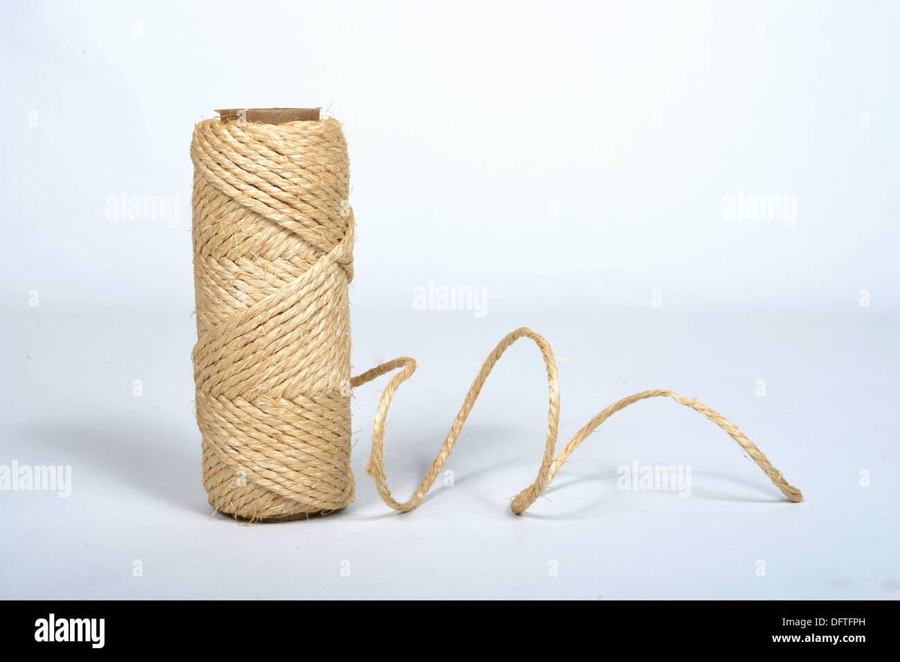 coil string on a white surface Stock Photo - Alamy