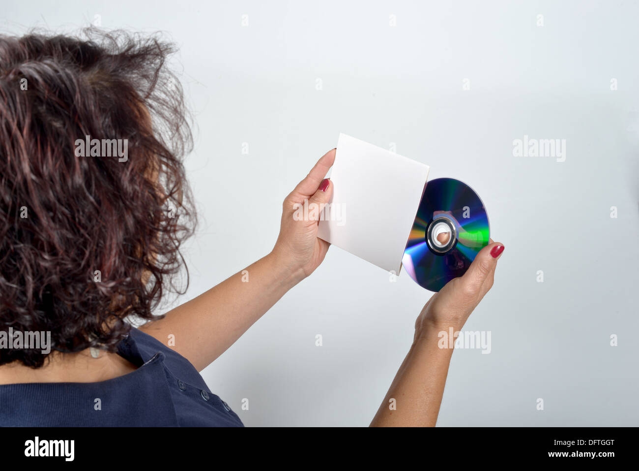 young woman holding a CD and its case Stock Photo - Alamy