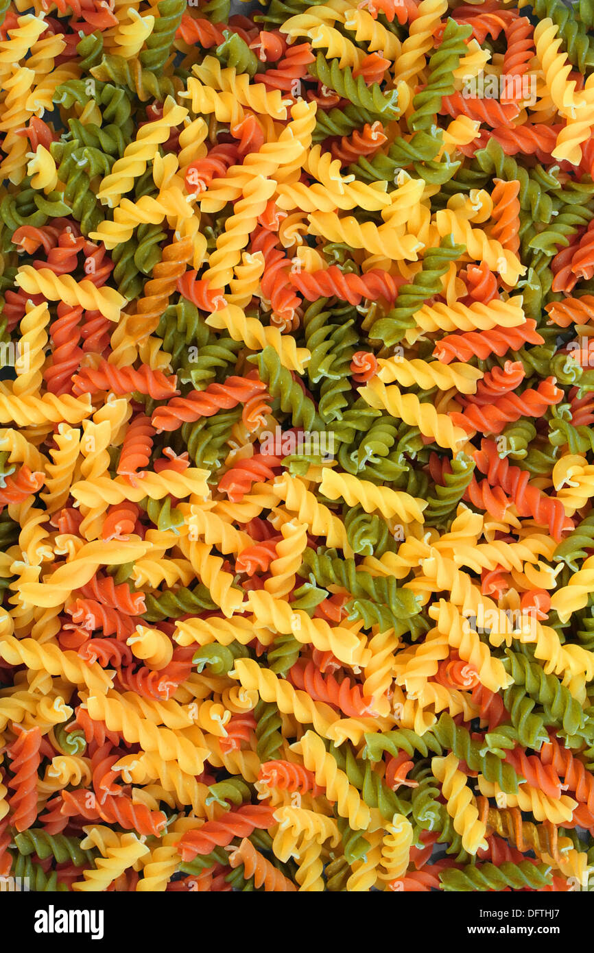 Top view of colorful twisted pasta pieces Stock Photo - Alamy