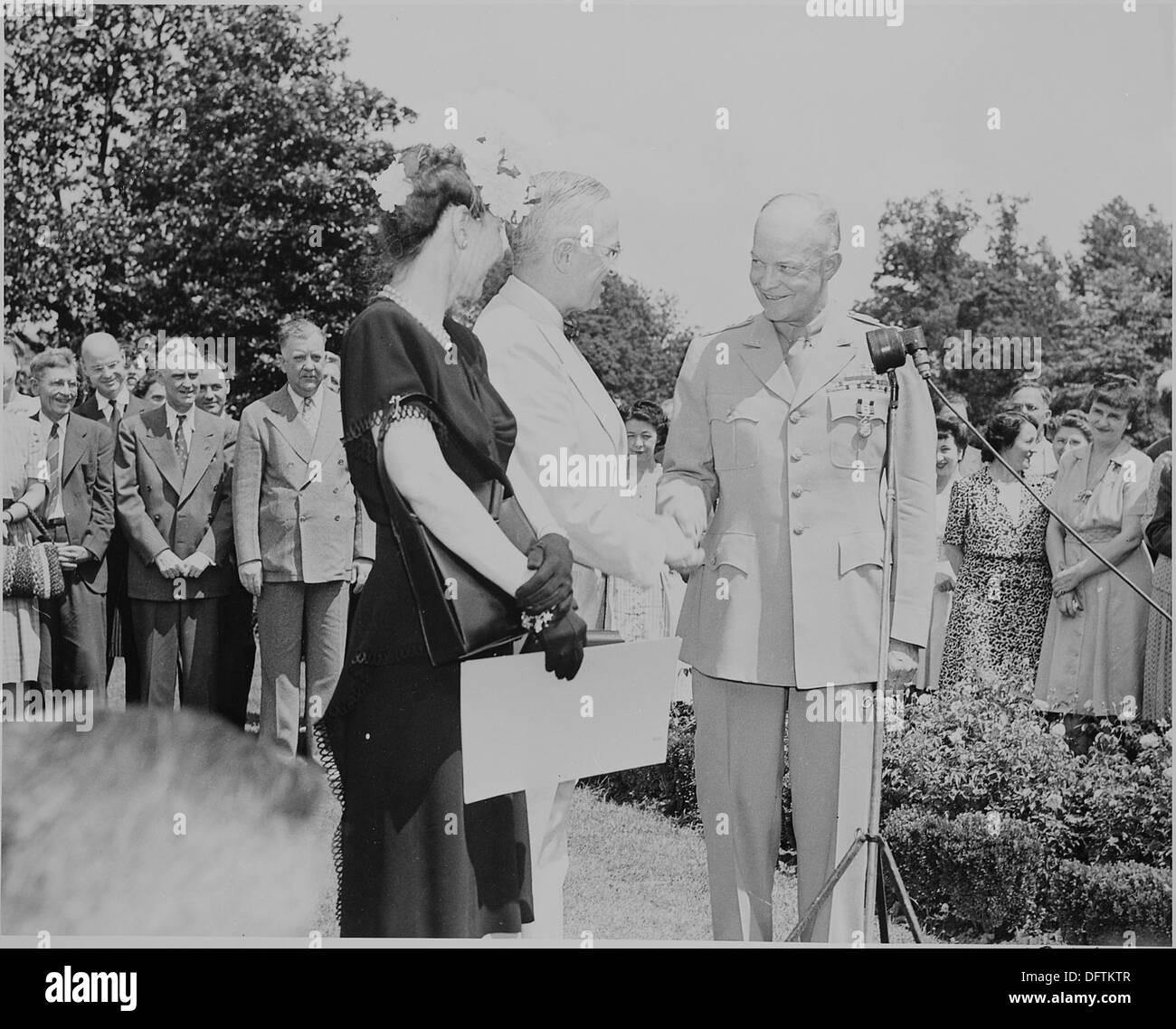 President Harry S. Truman is seen shaking hands with General Dwight D ...