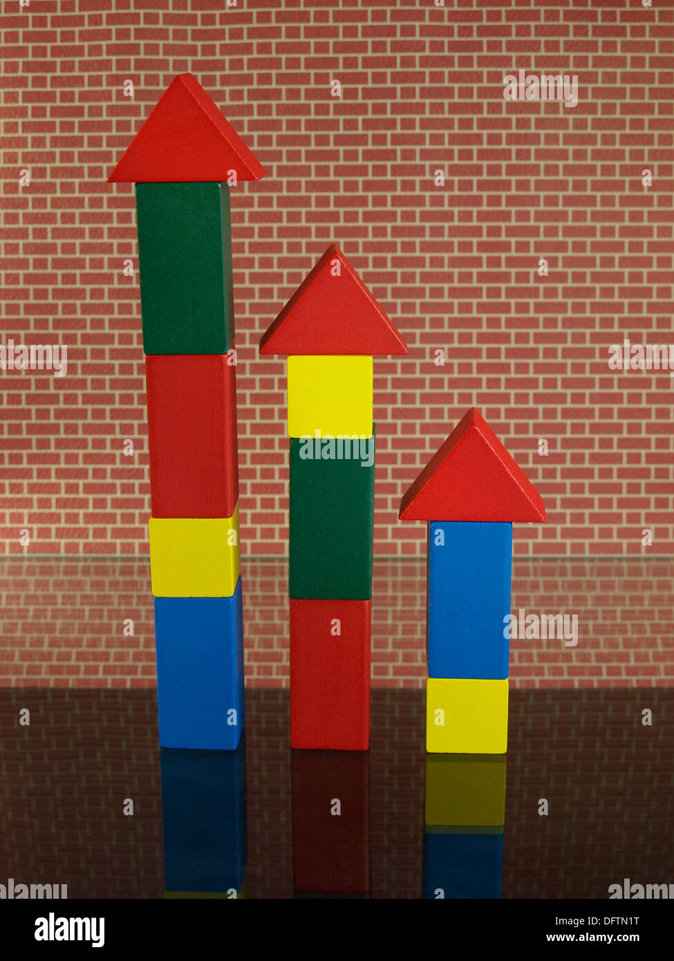 Wooden building block arrows Stock Photo - Alamy