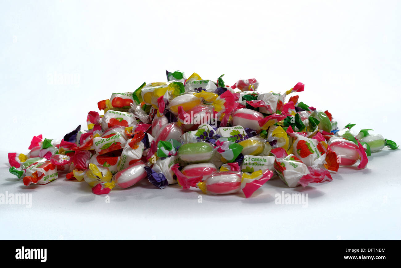 pile of candies on a white surface Stock Photo - Alamy