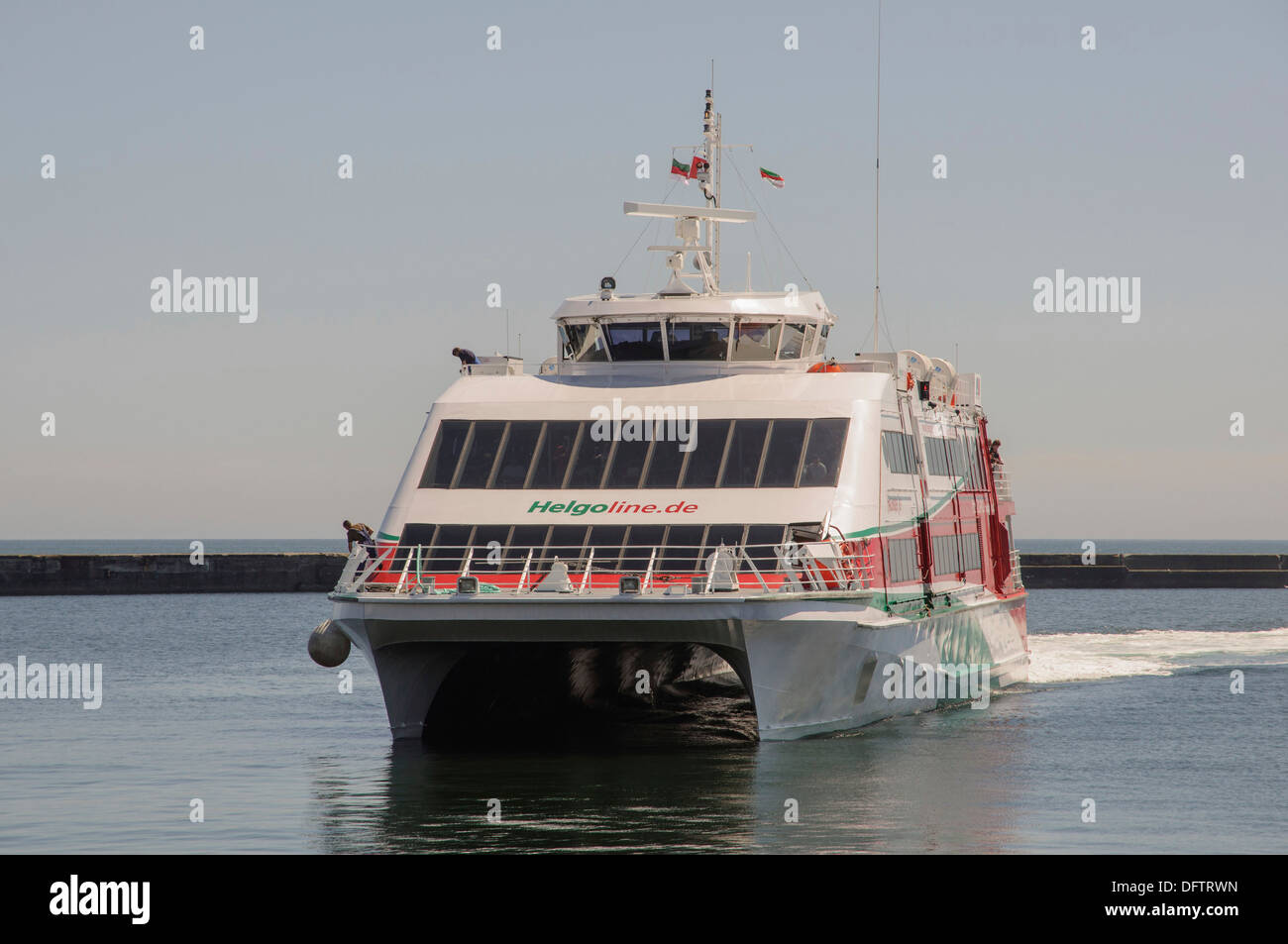 The catamaran Halunder Jet entering the harbour of Heligoland ...