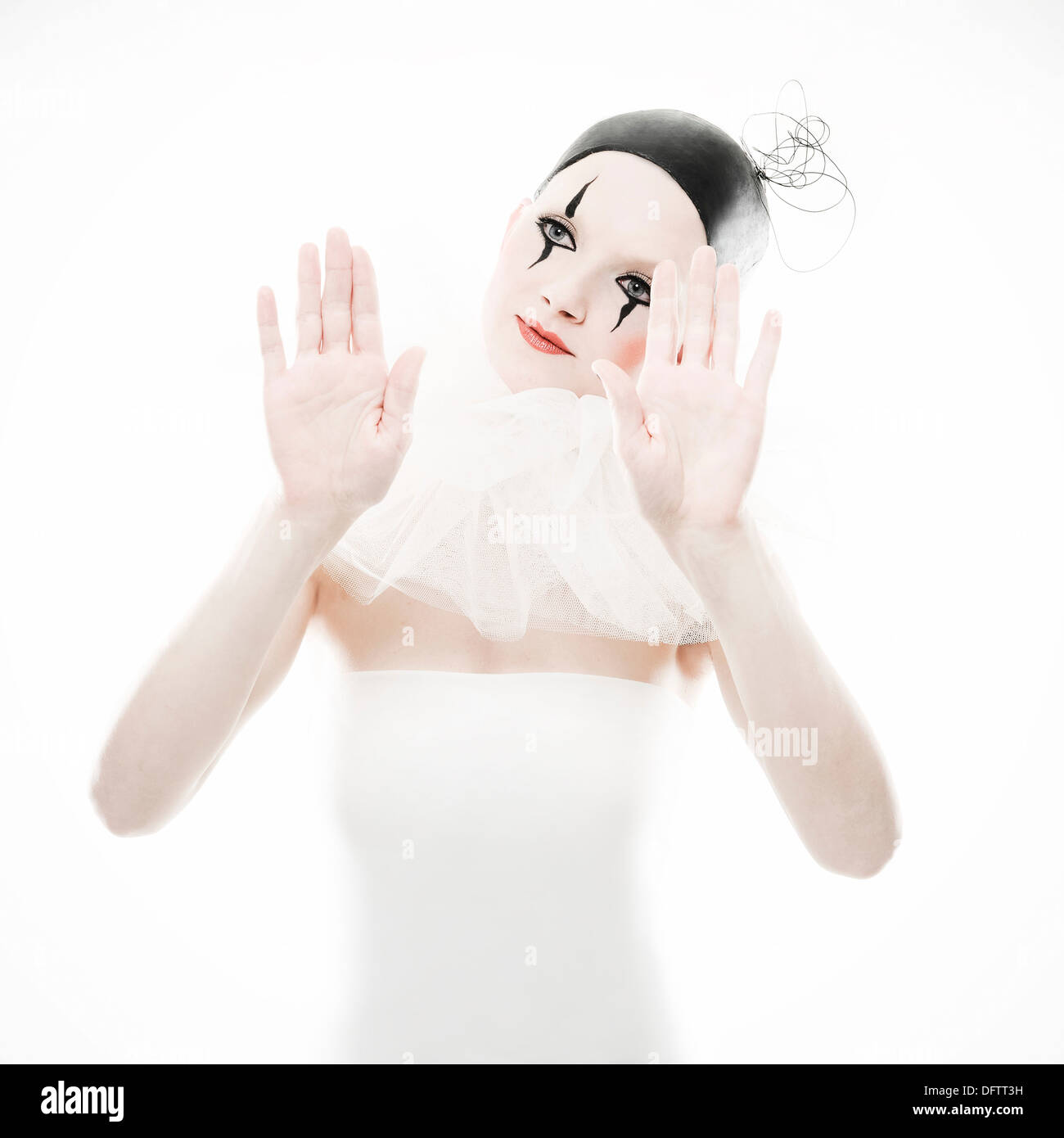 Woman dressed up as a pierrot Stock Photo - Alamy