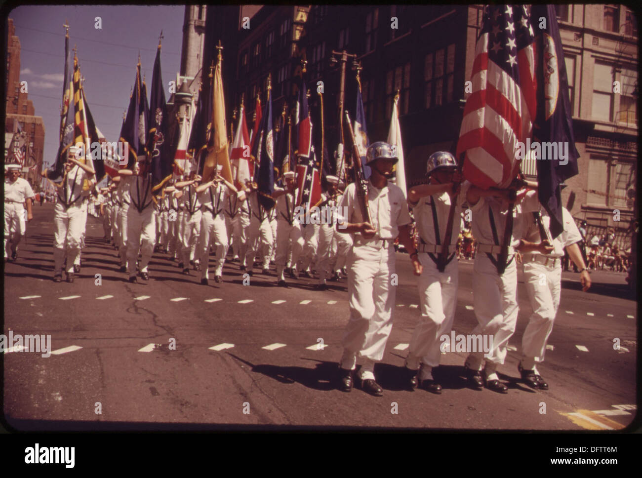 A U.S. Navy marching unit from Great Lakes, Illinois, participates in ...