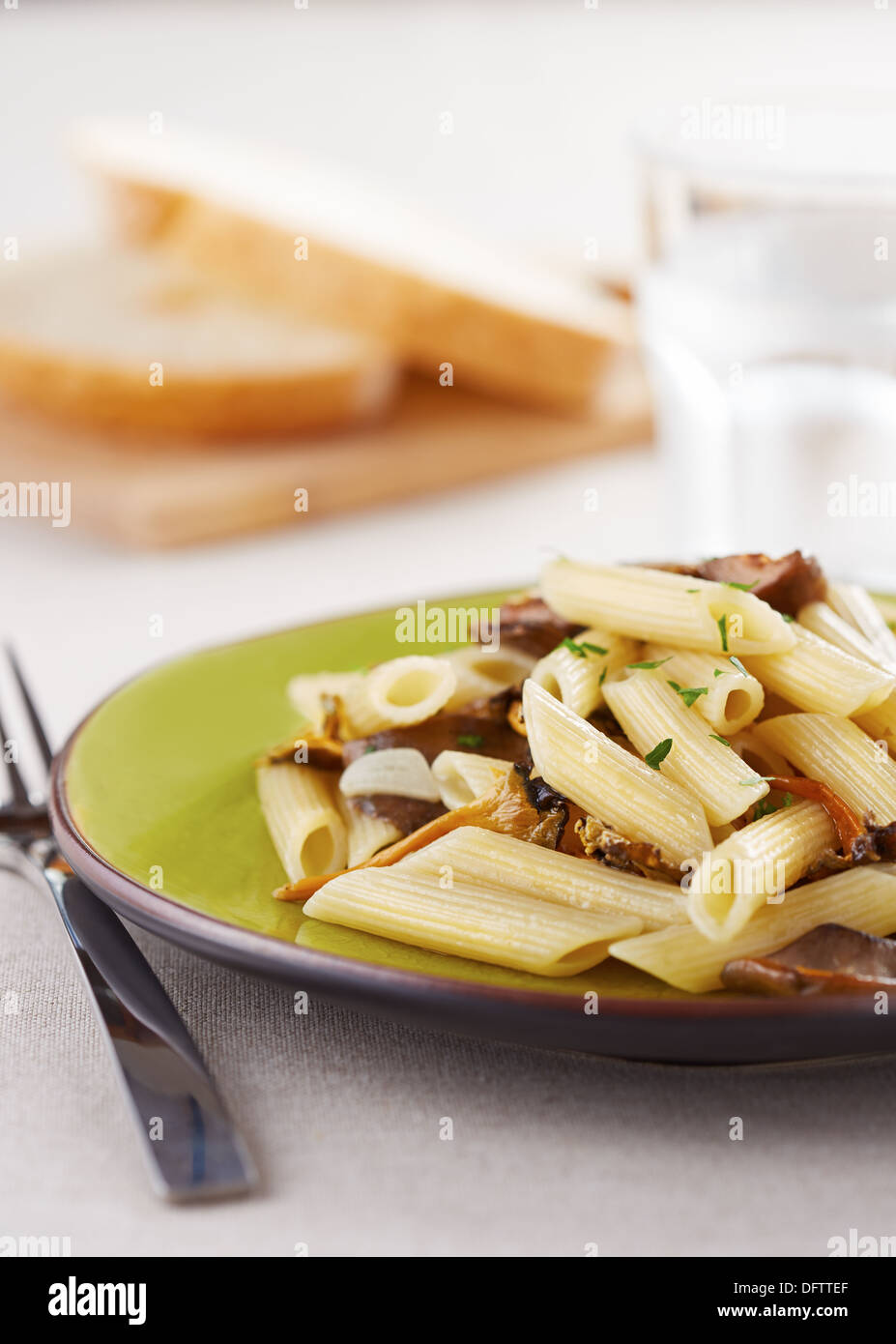 Yellow foot and red pine mushroom pasta dish Stock Photo - Alamy