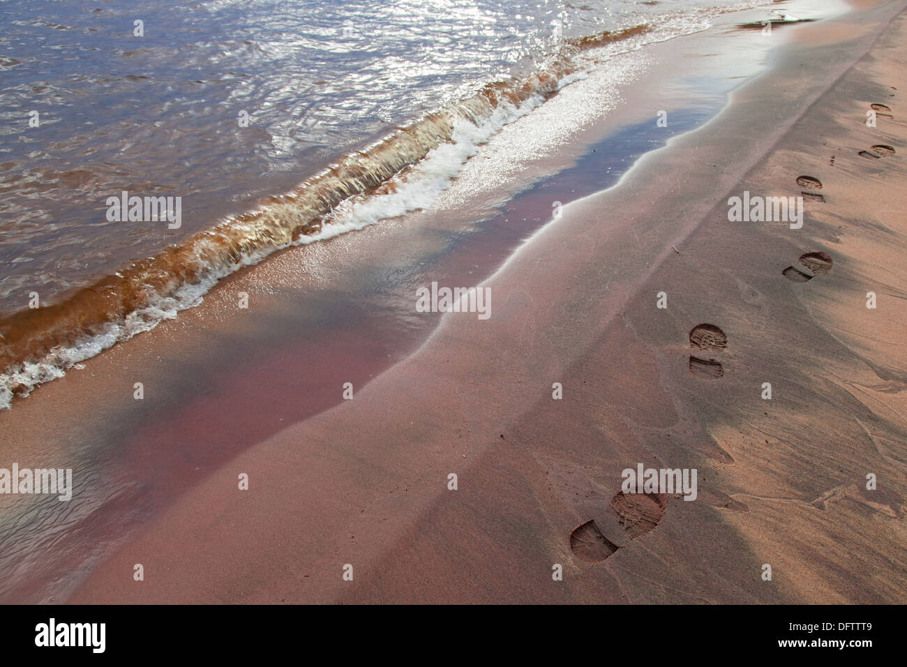 Onega lake in Kareliya. Traces from boots on sand Stock Photo - Alamy
