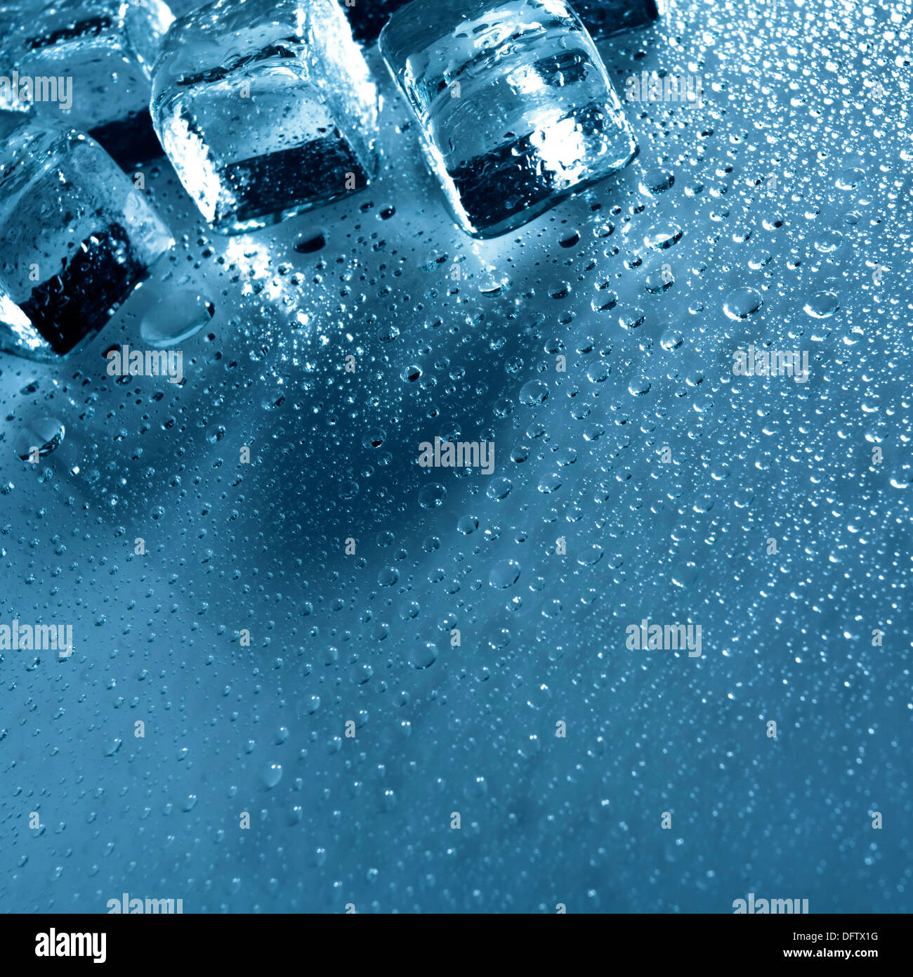 Ice with water droplets over abstract wet background Stock Photo - Alamy