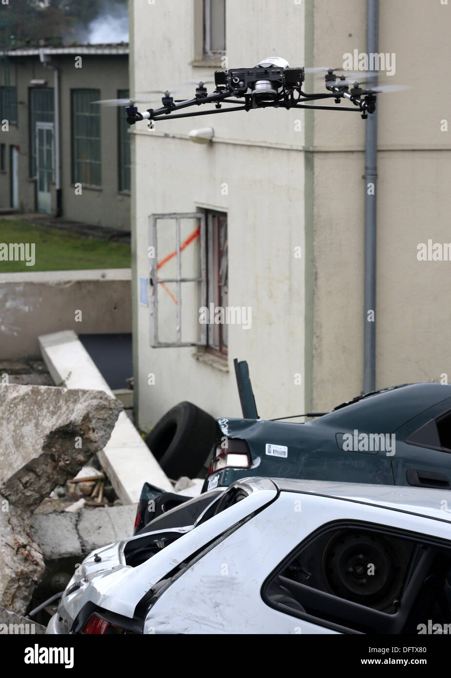 A type 'Asctec Falcon 8' micro unmanned aerial vehicle (UAV) is airborn ...