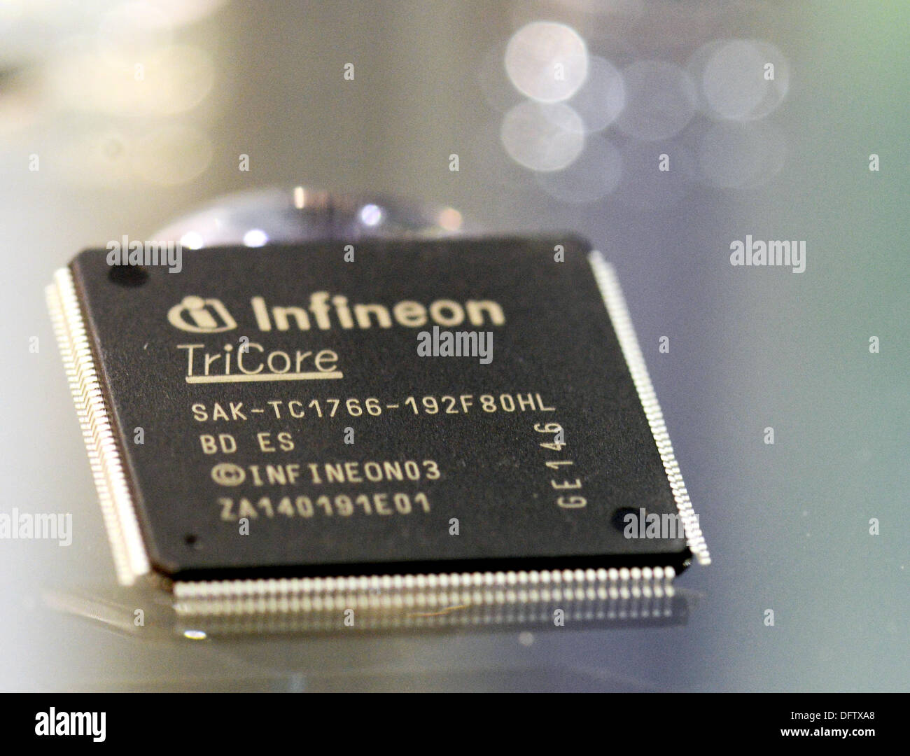 Dresden, Germany. 09th Oct, 2013. A chip at the booth of semi-conductor ...