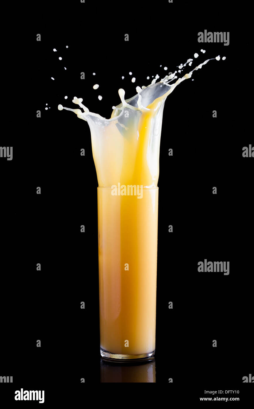 Orange juice splash hi-res stock photography and images - Alamy