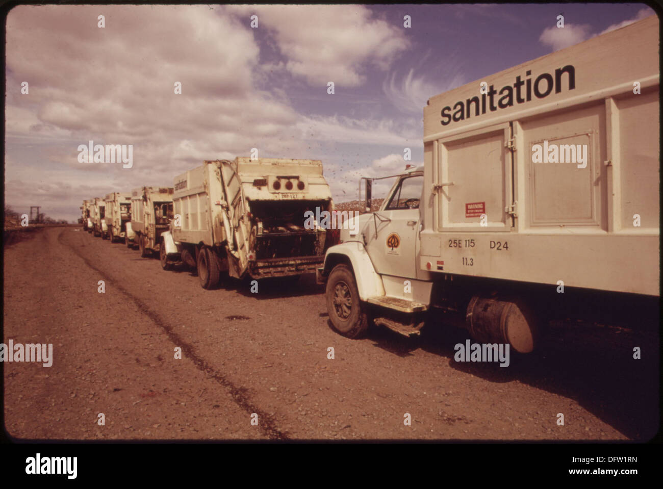 A procession of trucks transporting waste to an already overcrowded ...