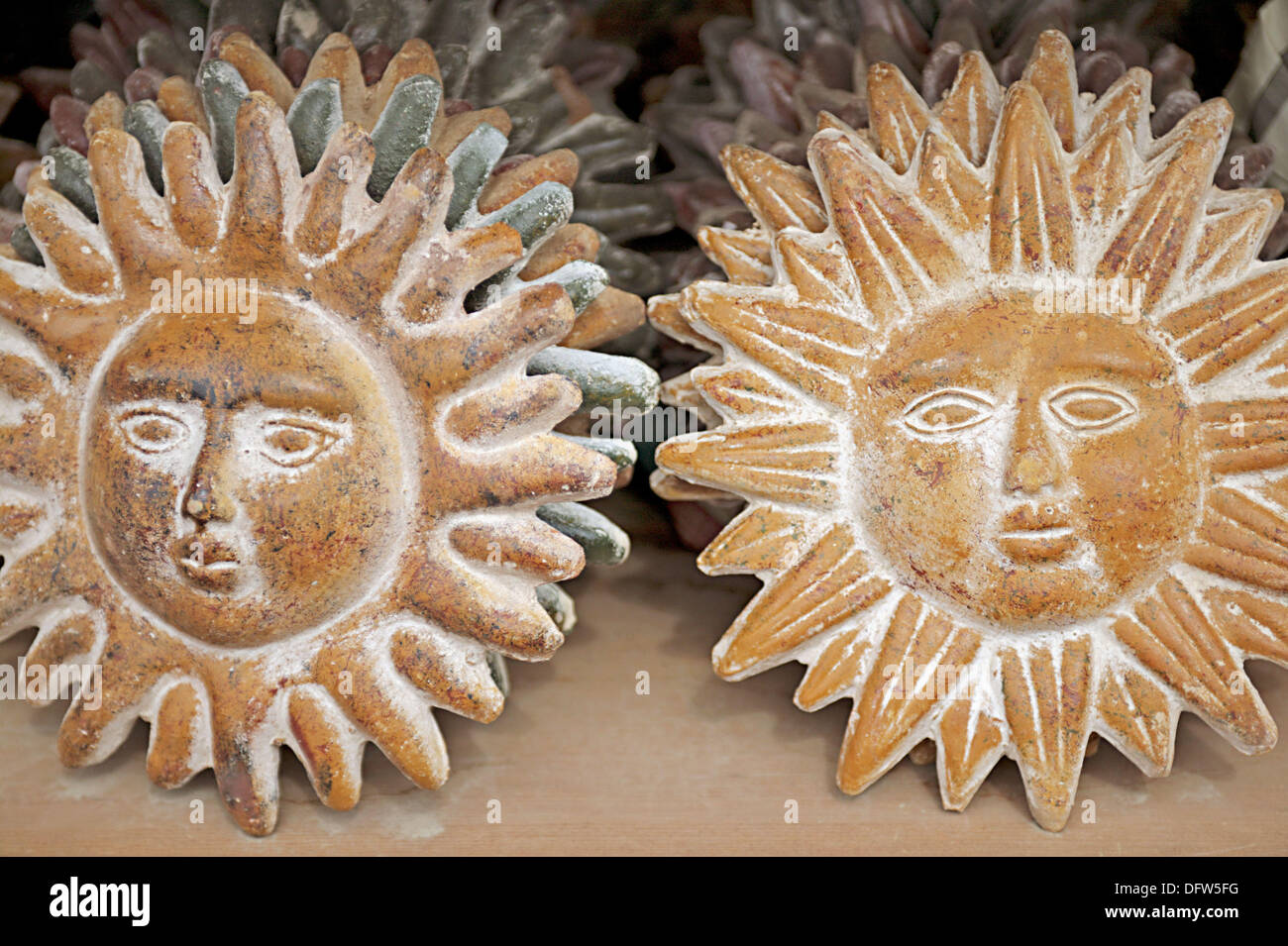 Terracotta sun faces hi-res stock photography and images - Alamy