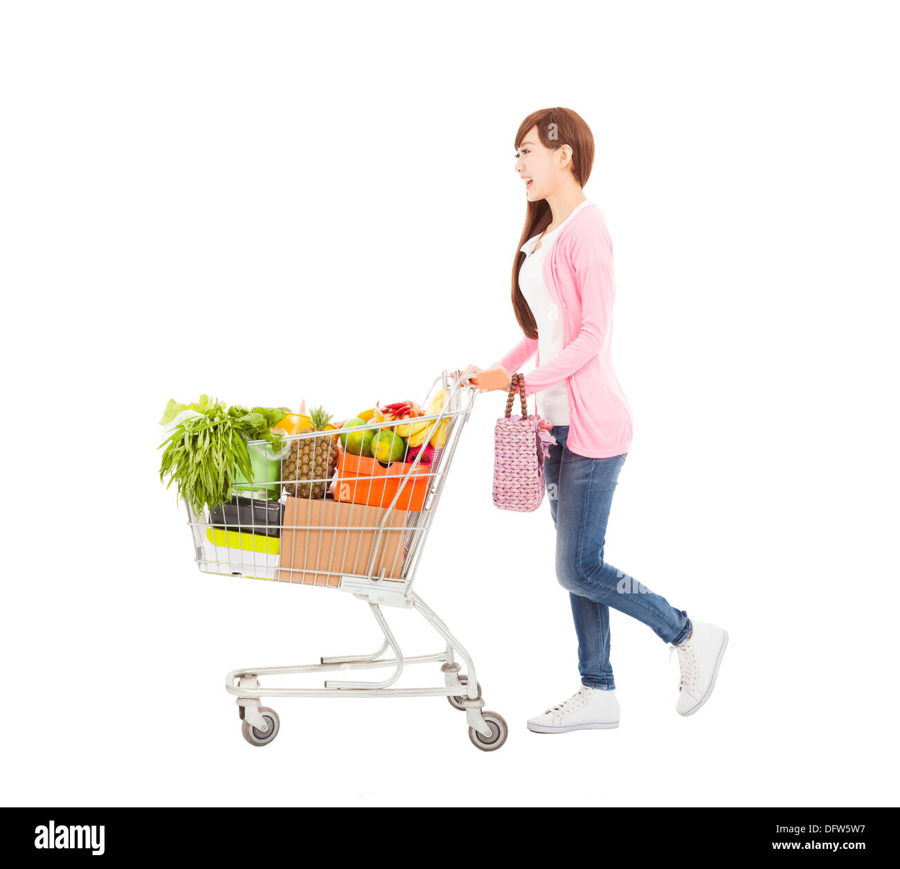happy young woman with shopping cart Stock Photo - Alamy