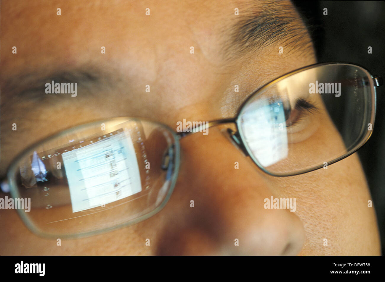 Computer reflecting in glasses hi-res stock photography and images - Alamy