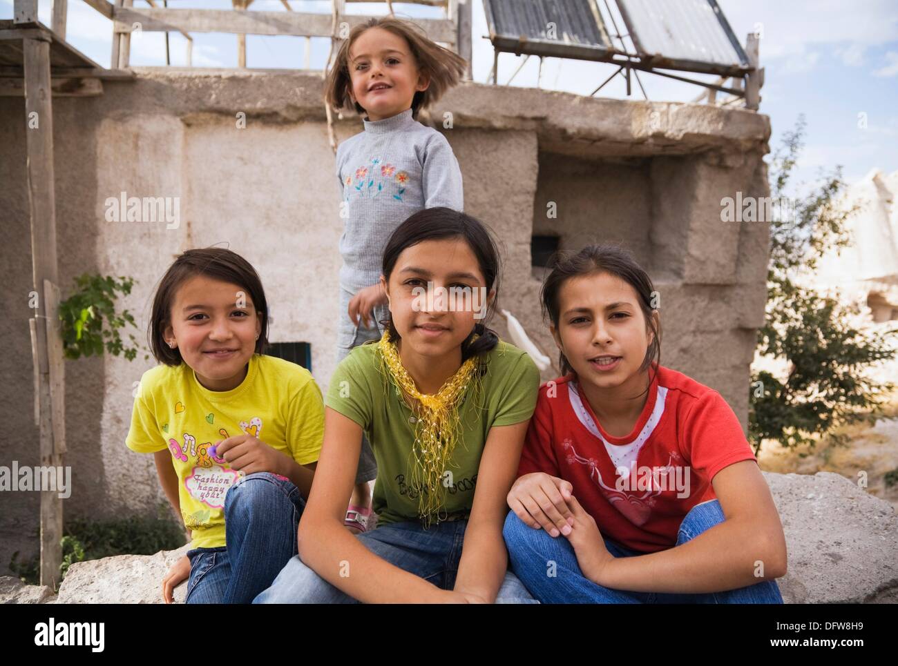 Young turkish girls smiling for the camera, Uchisar village, Cappadocia ...