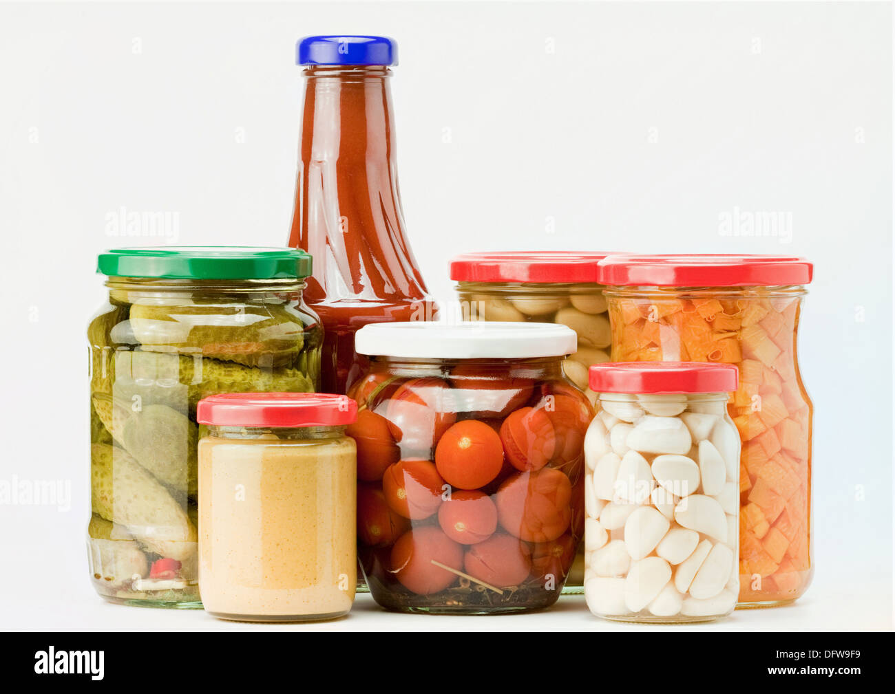 jars of preserved food isolated on white Stock Photo - Alamy