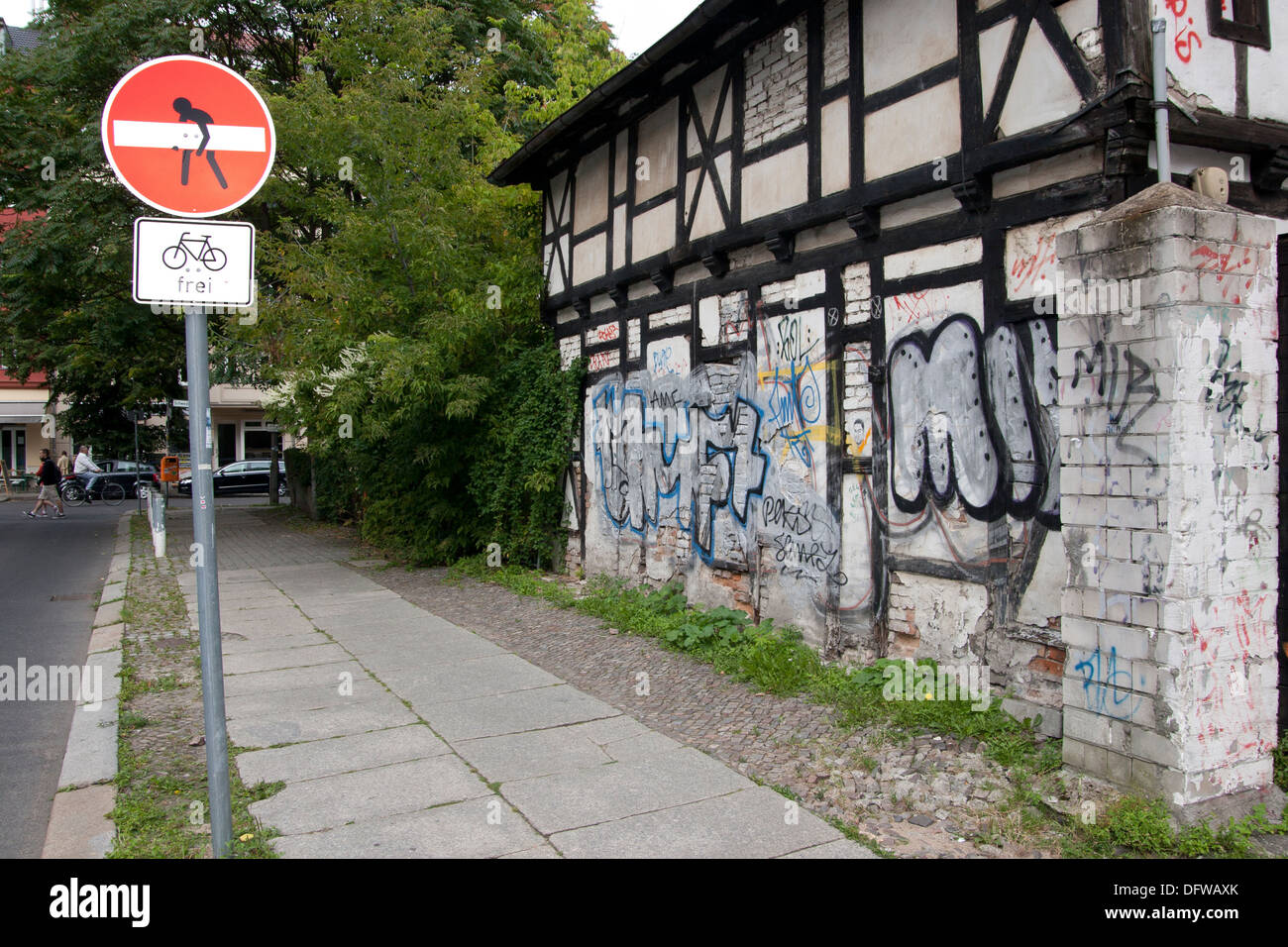 Street art on a one way street sign in Berlin, Germany Stock Photo - Alamy