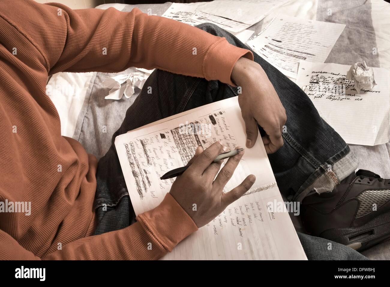 Solitary man writing hi-res stock photography and images - Alamy